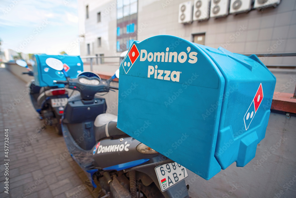 Minsk, Belarus. Oct 2020.. Dominos delivery scooter parked near pizza ...