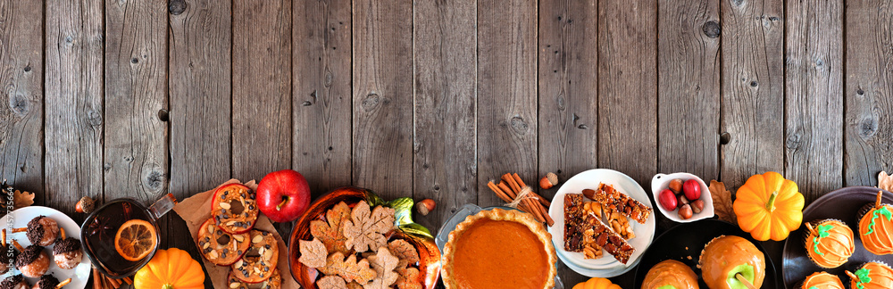 Autumn desserts bottom border. Table scene with assorted sweet fall ...
