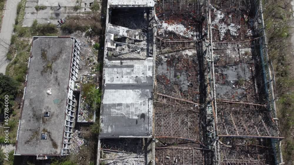 Aerial drone view of burned and abandoned industrial complex. Former ...