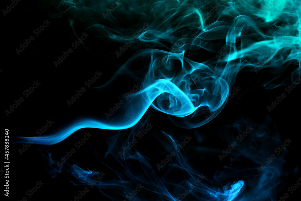Abstract colored smoke moves on dark background. Wallpaper. Personal ...