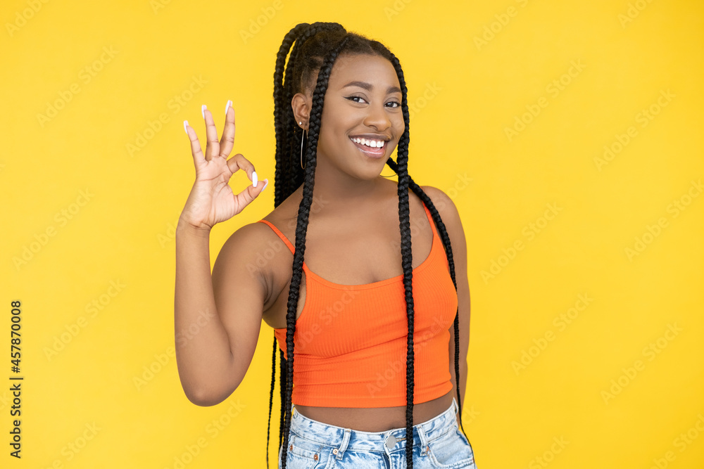 Okay gesture. Agreement sign. Good idea. Satisfied happy African woman ...