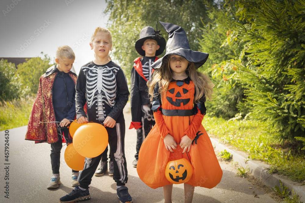 Halloween kids going to collect candy. Trick-or-treating. Guising. Jack ...