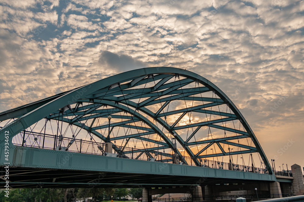 In Denver, Colorado, The famous Colfax Avenue bridge at Confluence Park ...