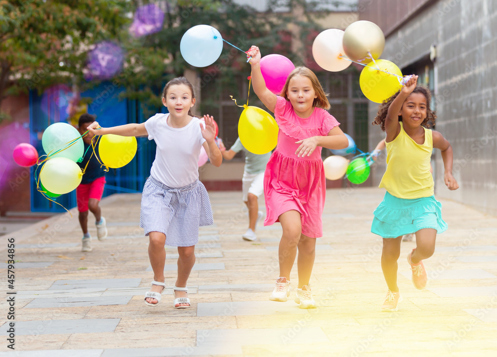 Happy tween friends of different nationalities having fun together on ...