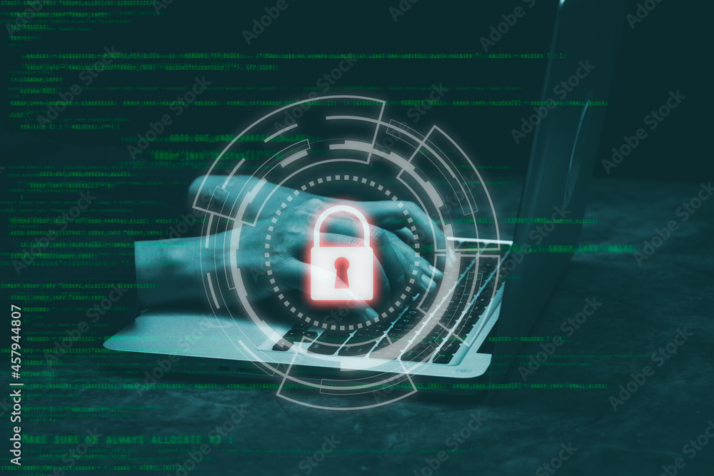 Hacker Hand Using Keyboard Typing Bad Data Into Laptop Computer Online System And Spreading To