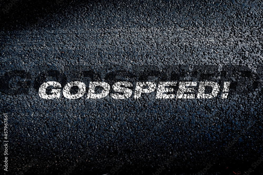 godspeed word write white color on dark asphalt texture background ...