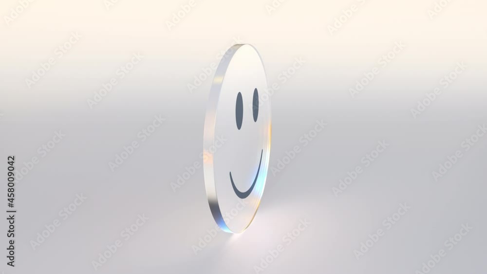 Sad and happy smileys on both sides of a spinning coin or token ...