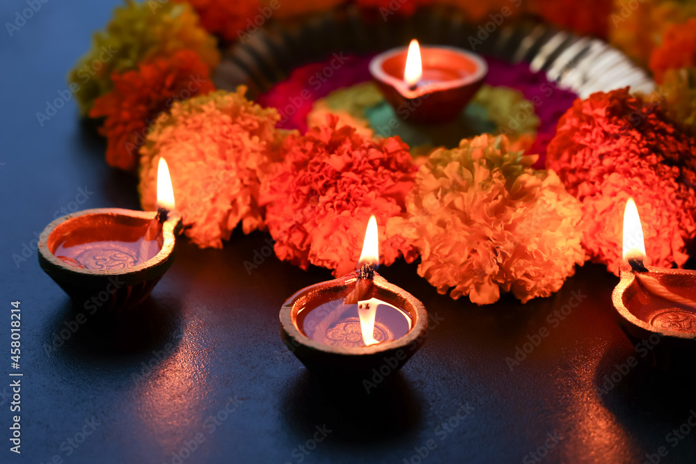 Diwali celebration Indian festival of lights Diya oil lamp and colors ...