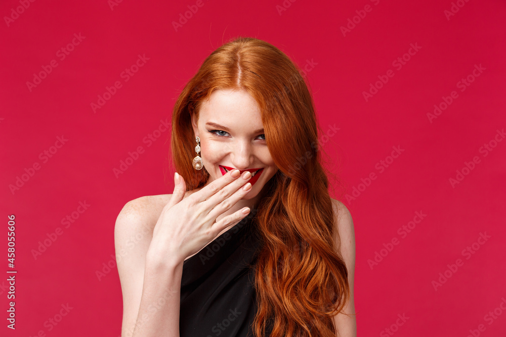 Close-up portrait of gorgeous silly and coquettish redhead girl acting ...