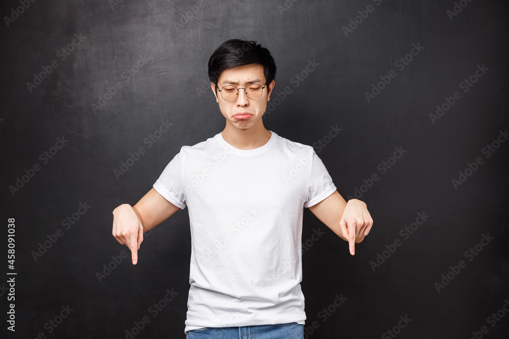 Whining and sobbing miserable upset asian guy feel gloomy, grimacing ...