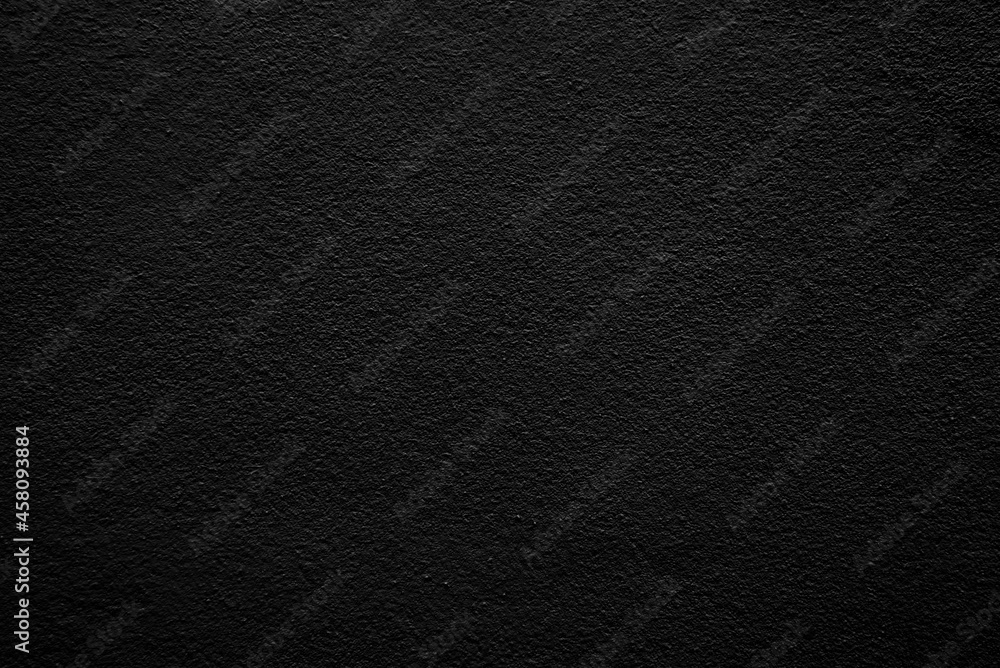 Seamless texture of black cement wall a rough surface, with space for ...