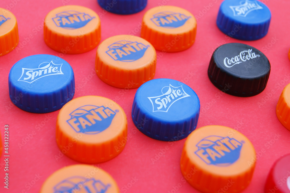 plastic caps from different drinks soda. Popular brands: Coca Cola ...
