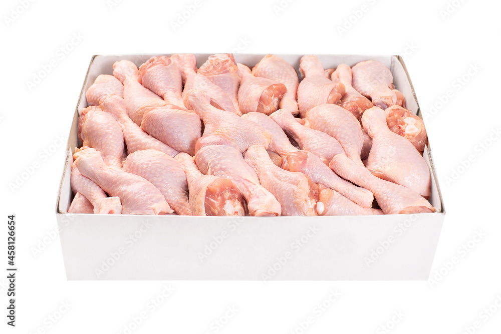 Fresh chicken leg with skin many pieces close-up in a cardboard box for ...