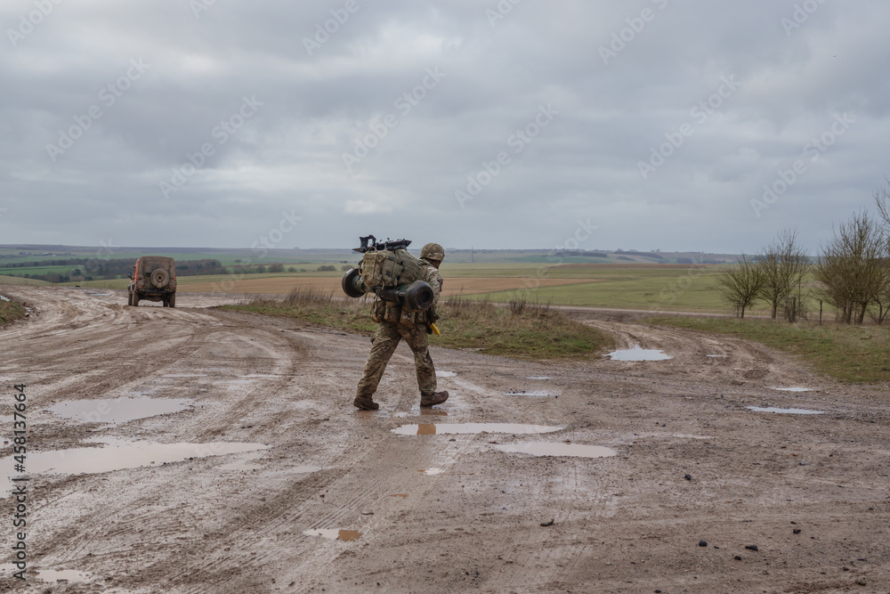 British army soldier completing an 8 mile tab tabbing exercise with ...