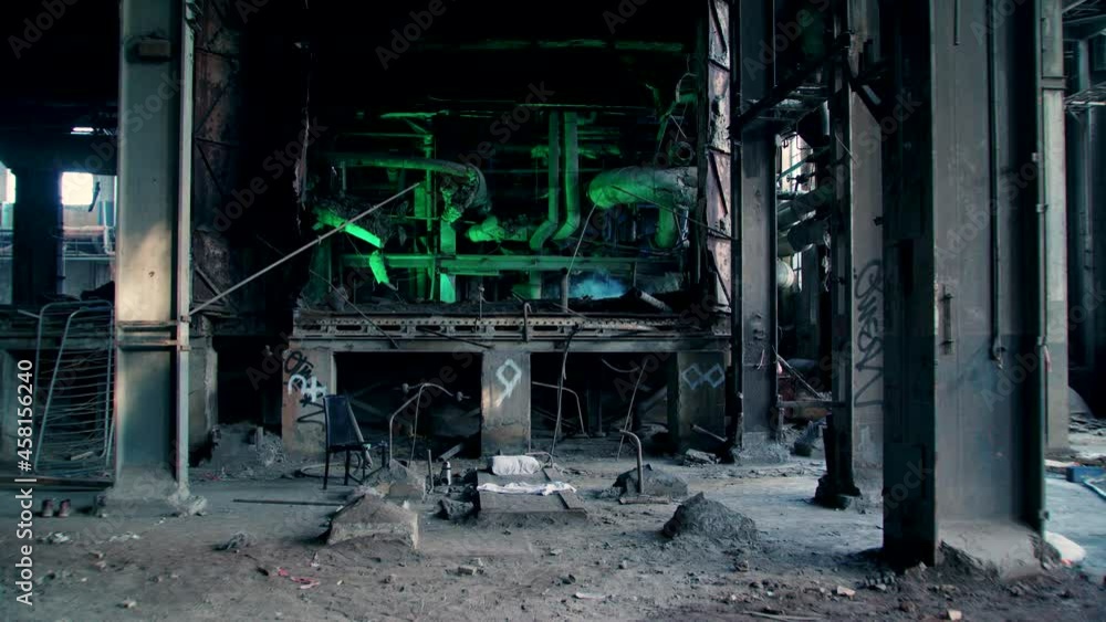 Creepy location in abandoned power plant with green pipes and white ...