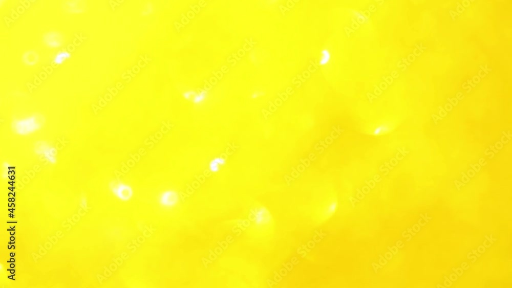 Abstract yellow background with moving and flicker particles. Magic ...