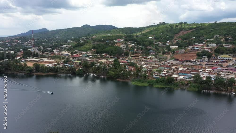 Aerial Adome village homes Volta river Ghana Africa part 1. Main river ...
