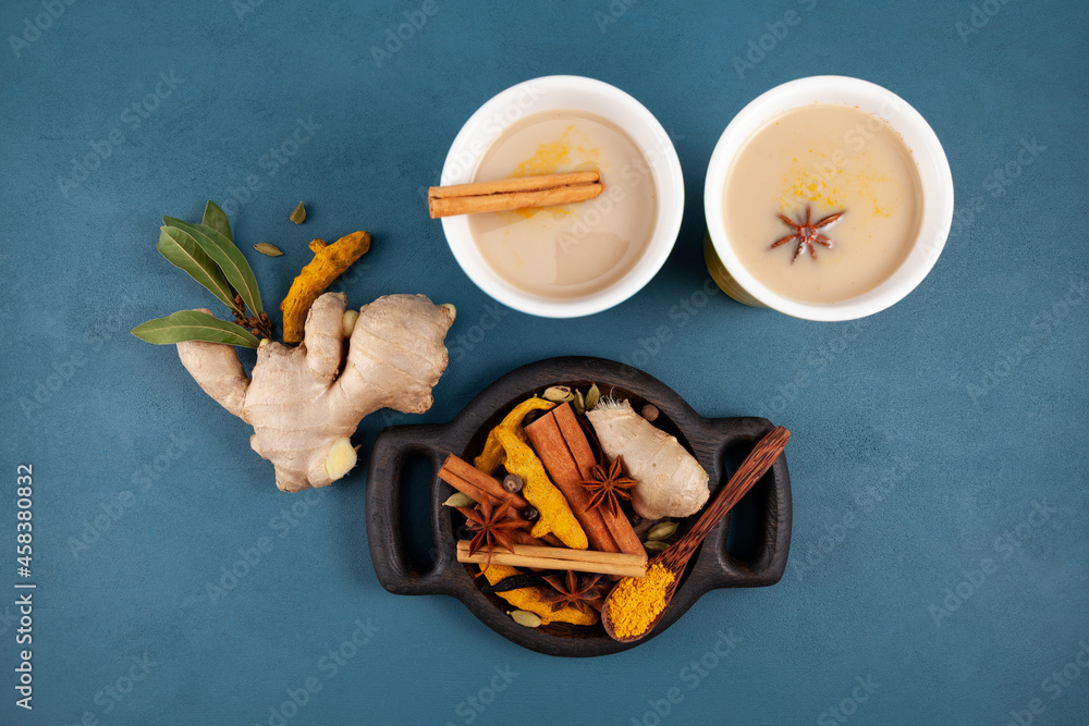 Popular Indian drink Karak tea or Masala chai. Prepared with the ...