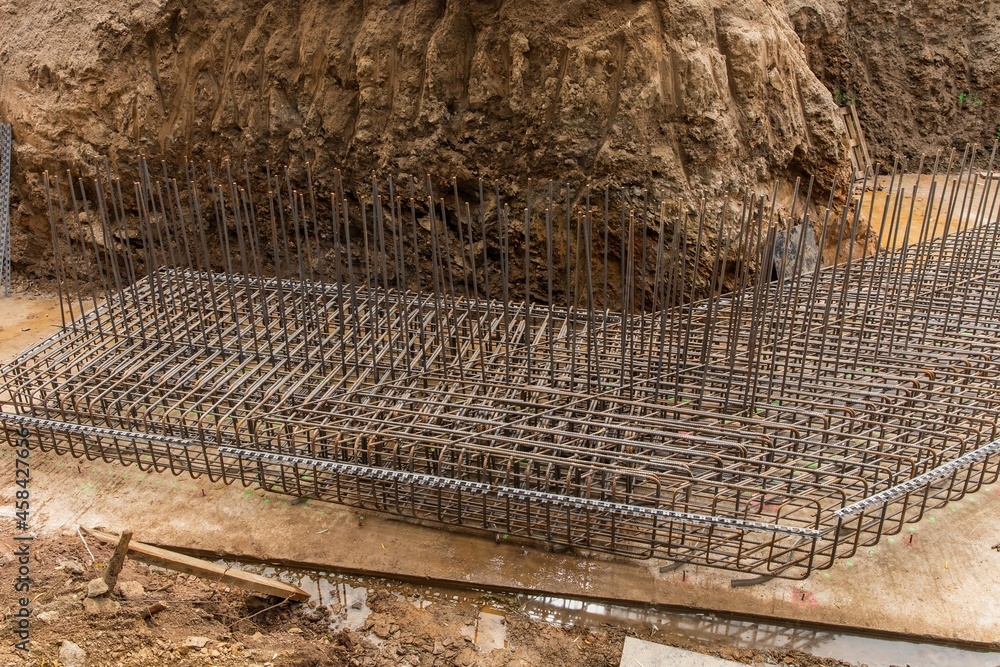 Iron or concrete reinforcement for building foundation construction ...