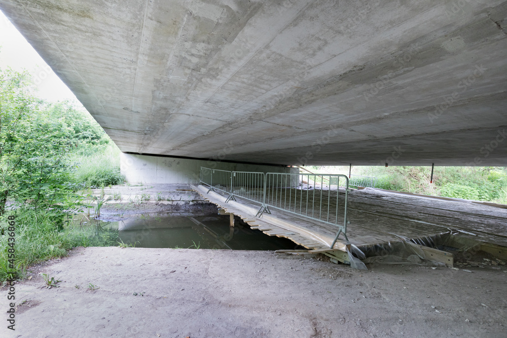Bridge reconstruction. Panels with reinforcing steel bars on top of ... Bridge reconstruction. Panels with reinforcing steel bars on top of ...