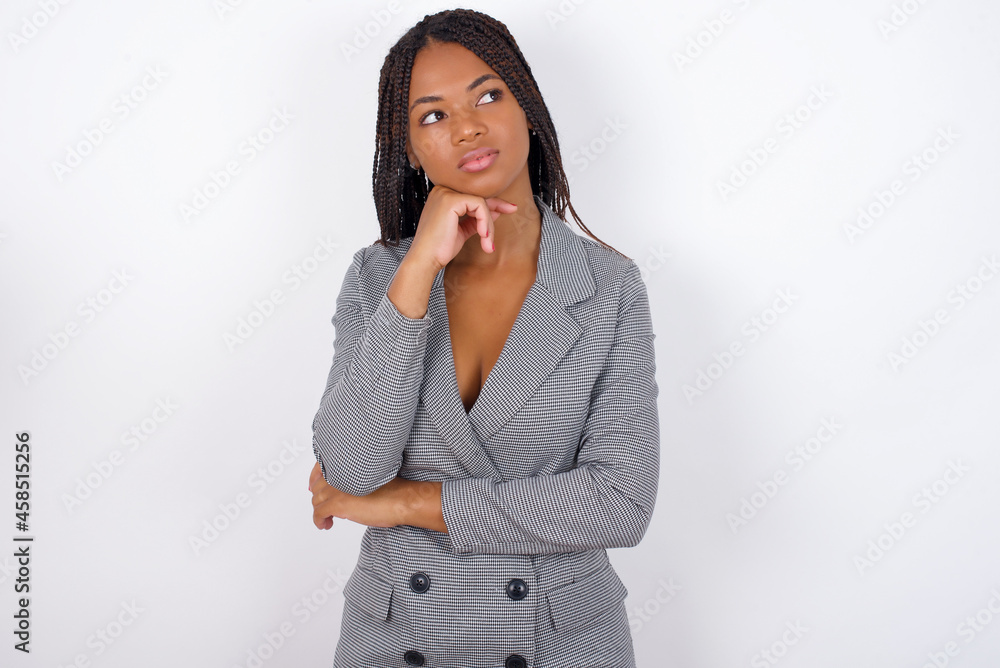 Face expressions and emotions. Thoughtful MODEL holding hand under his ...