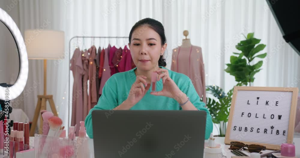 Asia woman micro influencer record live viral video camera at home ...