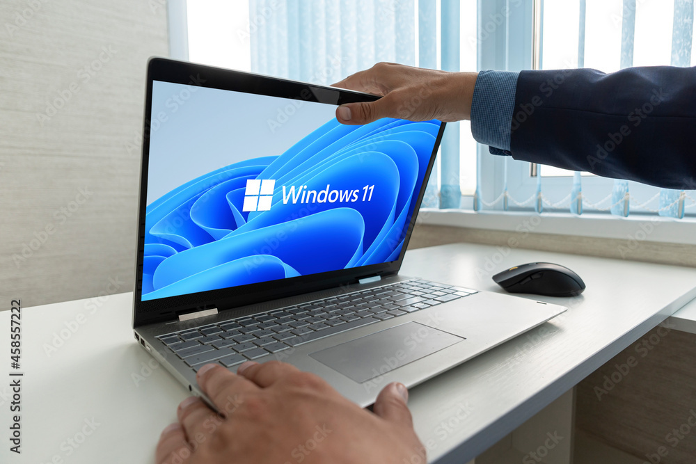 Windows 11 logo on laptop screen. A new operating system update from ...