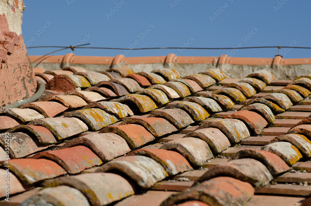 House: pitched roofs with brick tiles, exposed upper ridge and ridge ...
