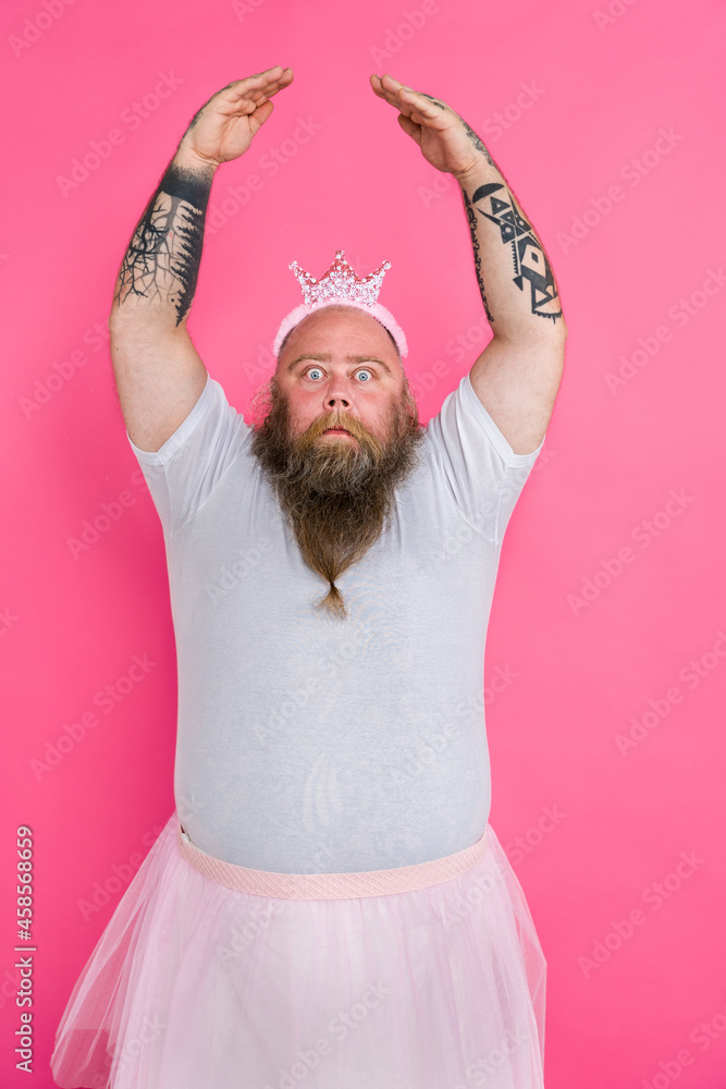 Funny fat man dressed like ballerina Stock Photo | Adobe Stock