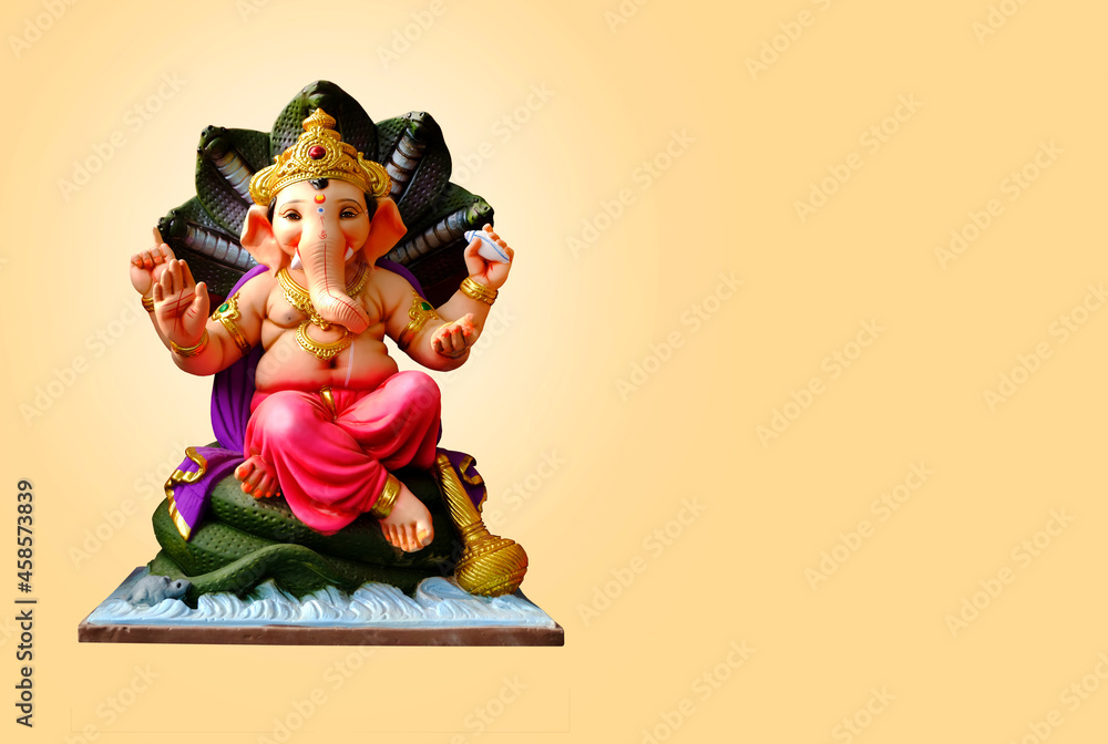 Hindu God Ganesha on colorful background, with copy space, Ganesha is ...