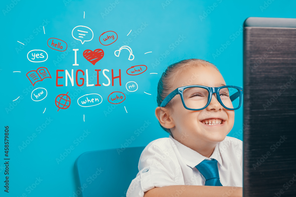 Beautiful cute little girl with eyeglasses and tie smiling and using ...