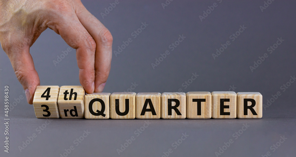 From 3rd to 4th quater symbol. Businessman turns cubes and changes ...