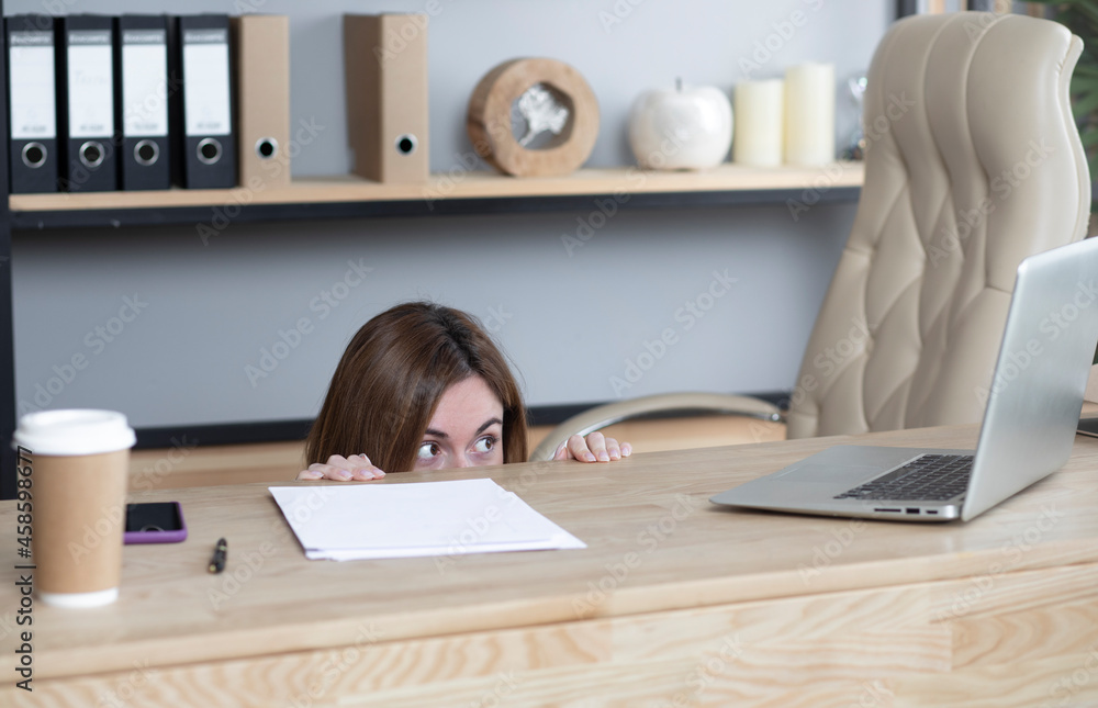 Hiding Under Desk Office Worker