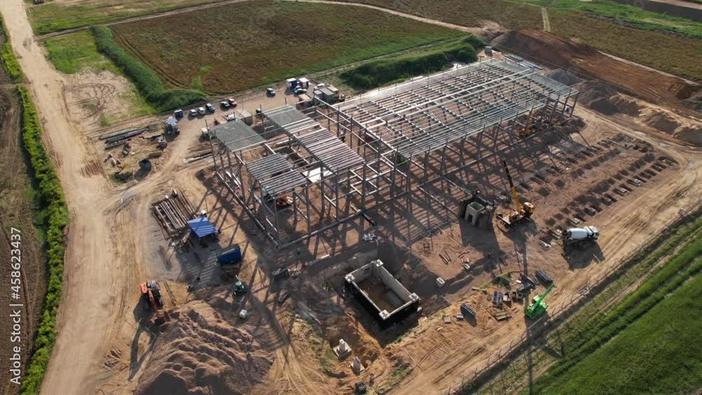 Construction of warehouse from metal structures. Industrial building on ...