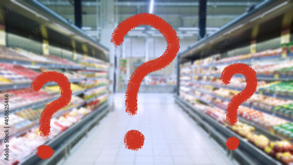 Three large red question mark on abstract blur image of supermarket ...