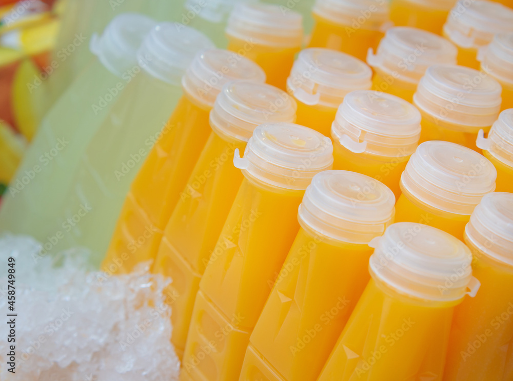 Freshly squeezed orange juice and guava juice are packed in ready-to ...