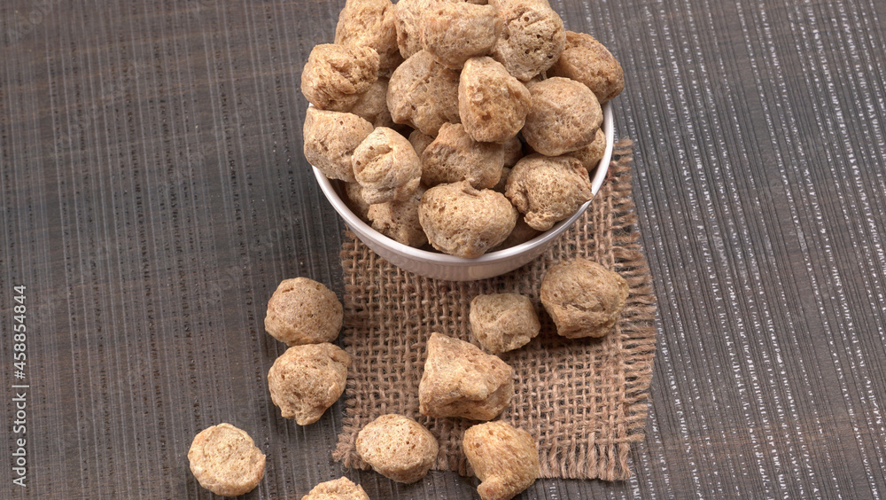Raw soya chunks on dark background. Healthy, nutritious soybean meat ...