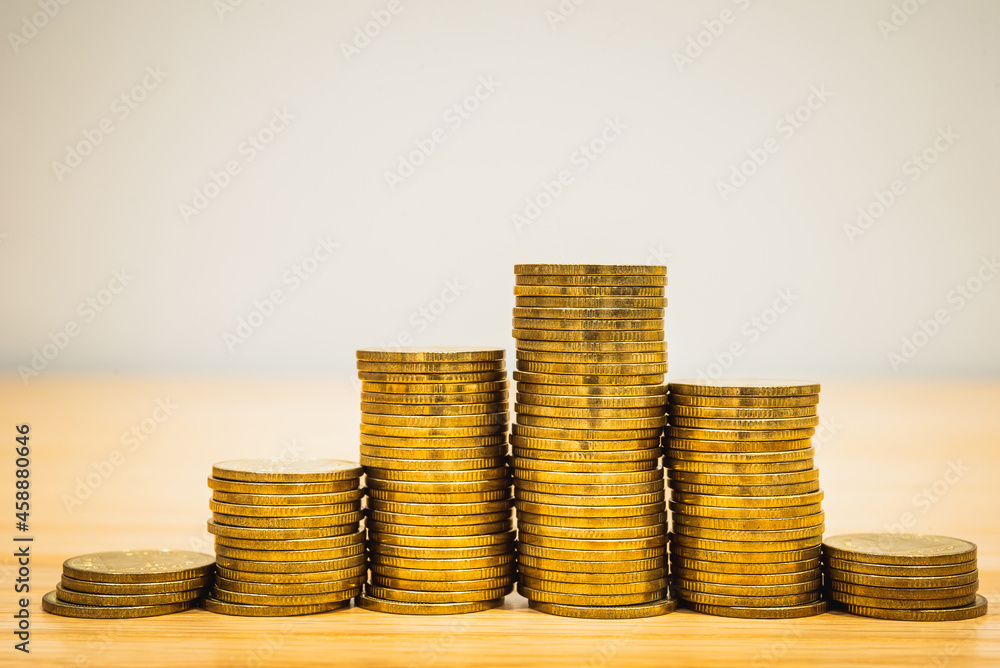 Gold coins stacks is representing riches and wealth management. Coin ...