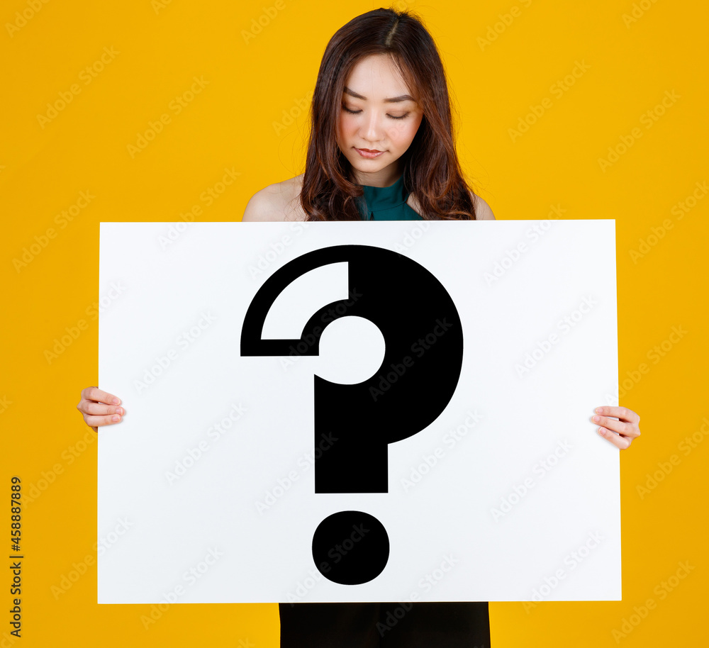 Young happy Asian women holding huge white cardboard sign with question ...