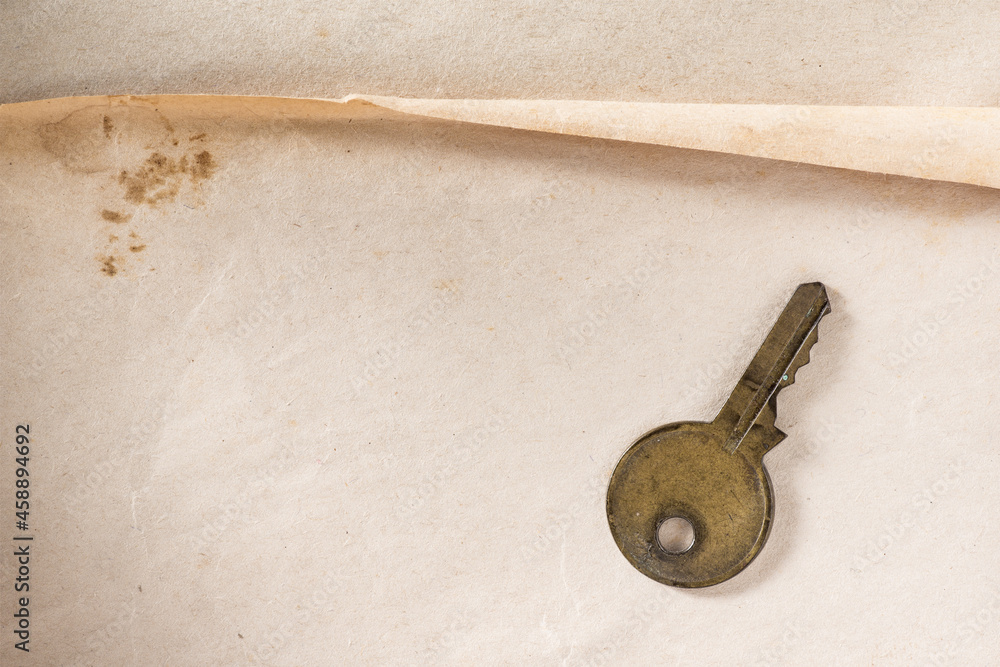 vintage key on space of old paper texture Stock Photo | Adobe Stock
