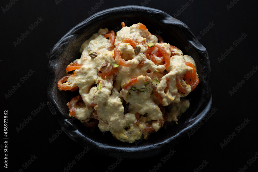 Crispy Sweet Jalebi, Jilapi, zulbia, mushabak or zalabia in white oval ...