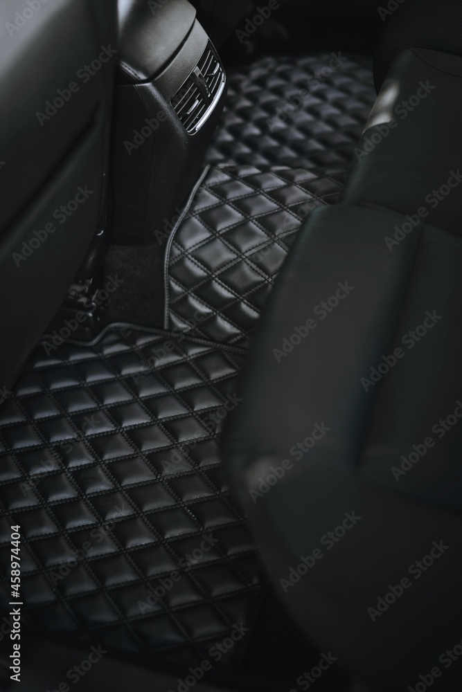 Car floor mat with diamond pattern. Ecoleather dark floormat on the ...