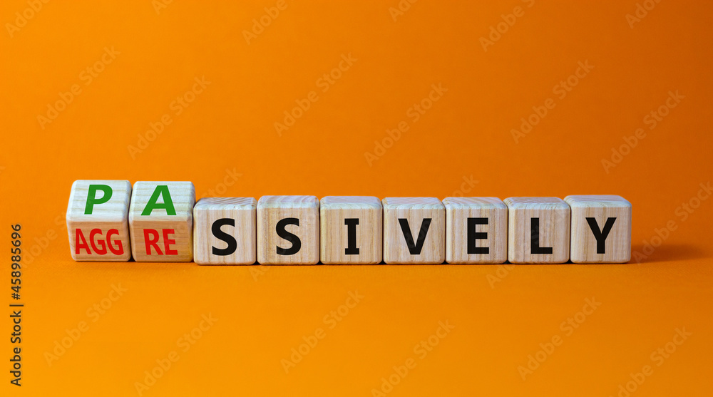 Passively or aggressively symbol. Turned wooden cubes and changed the ...
