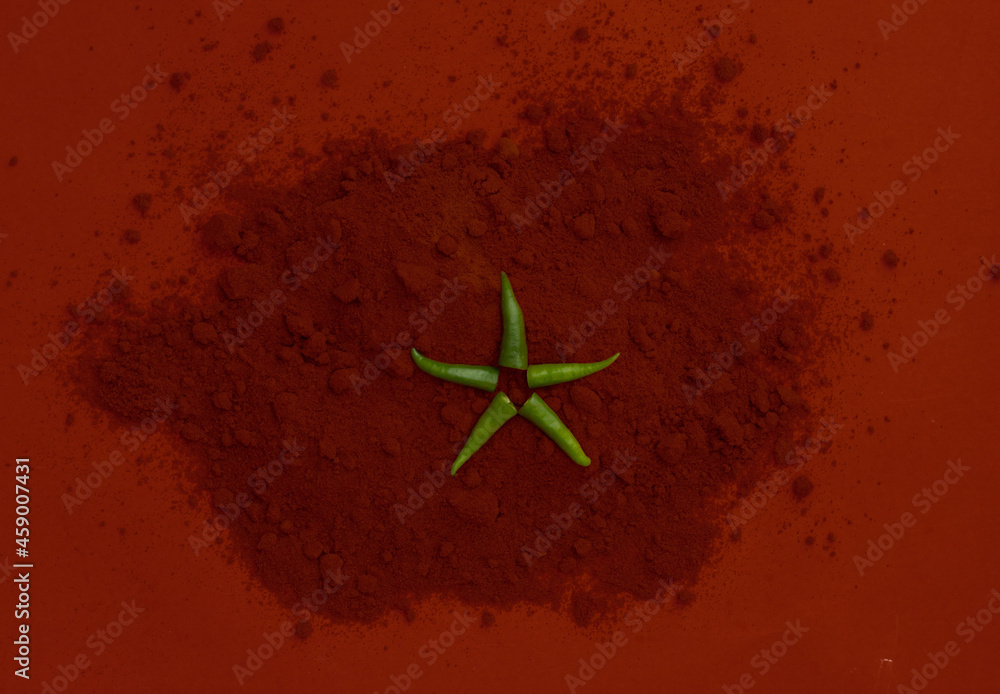 Moroccan flag portrayed with paprika and hot green chilly peppers, as a ...