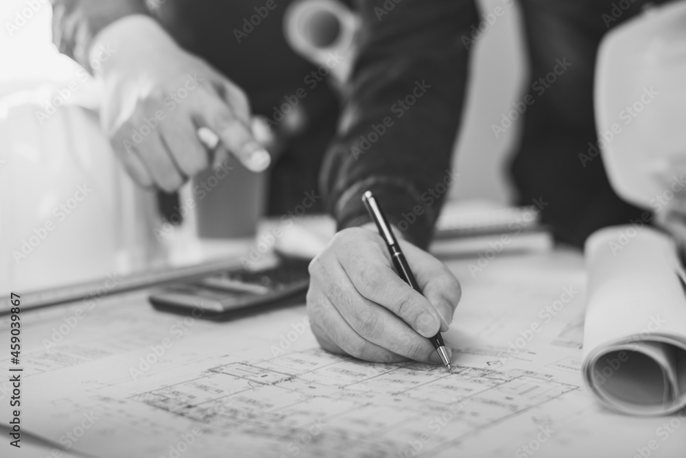 Architect working on blueprint. Architects workplace - architectural ...