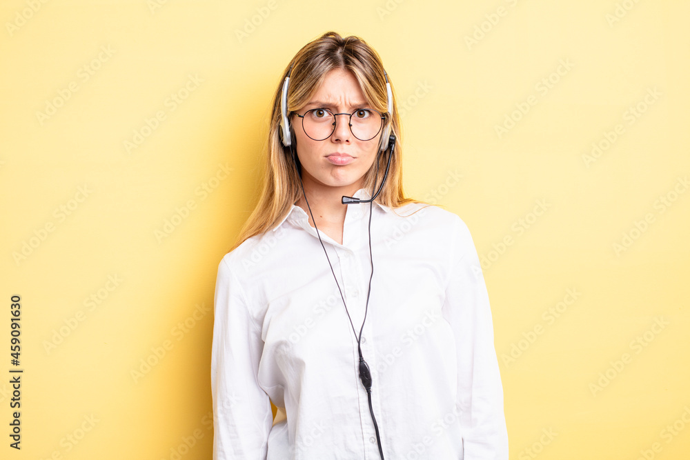 pretty blonde girl feeling sad and whiney with an unhappy look and ...