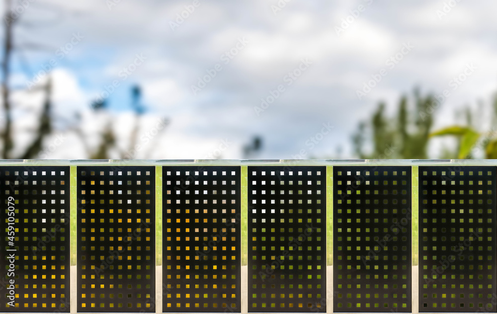 Perforated Metal Fence. Metal sheet panel fence Stock Photo | Adobe Stock