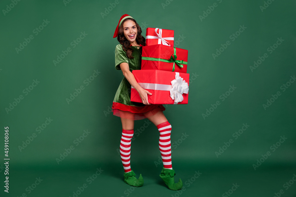 Full length body size view of pretty cheerful girl elf bringing ...