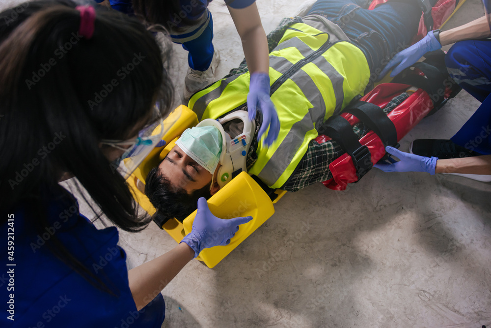 Employee accident in construction site work. Team EMS paramedic first ...