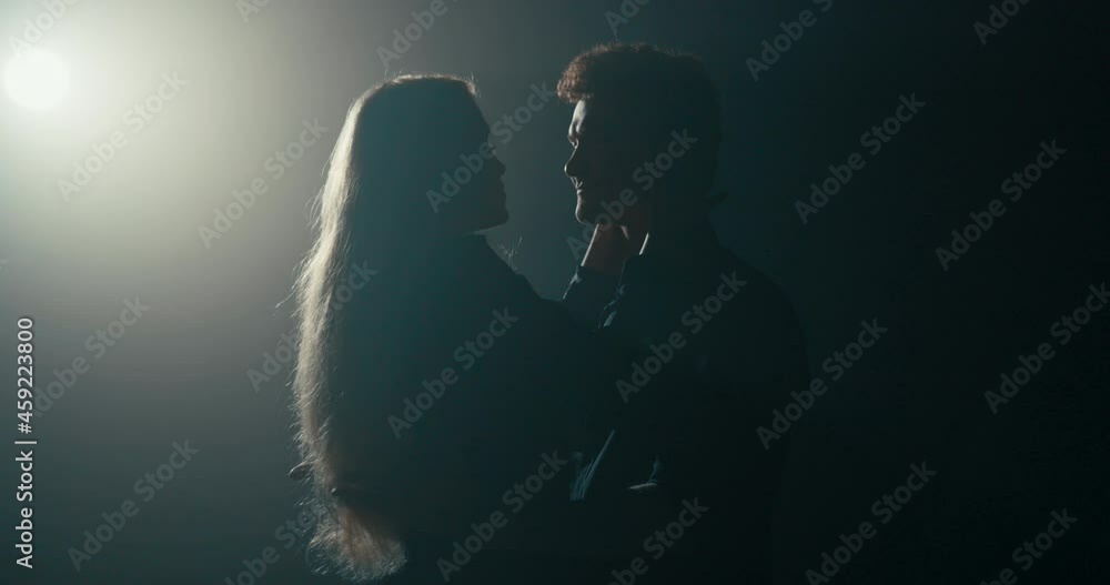 Shot of couple in love standing close together beautiful blonde puts ...